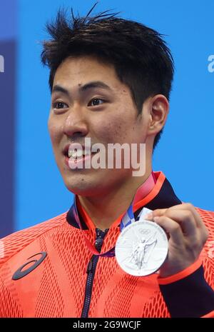 TOKYO, JAPAN - JULY 28: Tomoru Honda of Japan celeebrates showing the ...