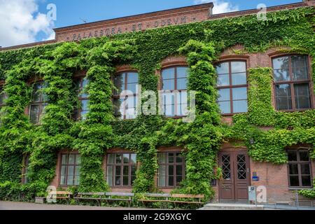 Lund University Plaza with fountain and Palaestra et odeum in Lund ...