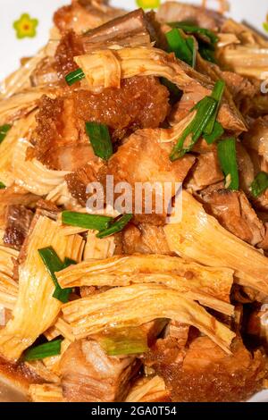 Chinese style of crispy fried belly pork with spicy chilli powder on ...