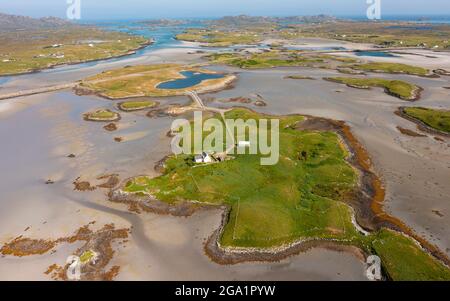 Aerial view from drone of Benbecula road causeways crossing estuaries ...