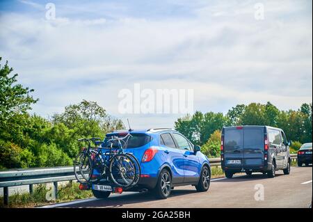 Freeway 11, Germany - September 15, 2019: Car with a bike carrier attached to the stern and ...