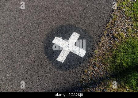 Painted cross marking a triangulation point Stock Photo - Alamy
