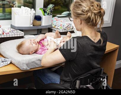 Close up of baby injury. Baby's expression and the scar on the forehead ...