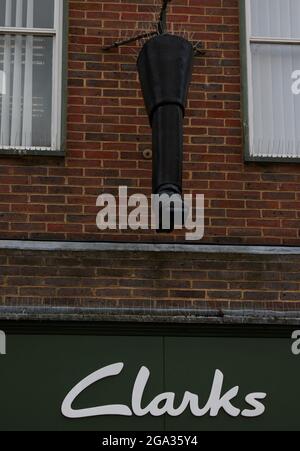Close up of Clarks logo and sign at their store in a shopping mall in ...