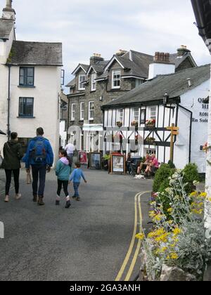 Tourists flock to the pretty hilltop village of Hawkshead in the Lake ...