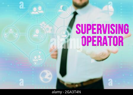 Hand writing sign Supervising Operator. Concept meaning monitoring and ...