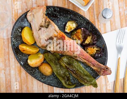 Lamb shoulder baked with new potatoes Stock Photo - Alamy