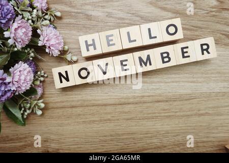 Hello November alphabet letters on blue background Stock Photo - Alamy