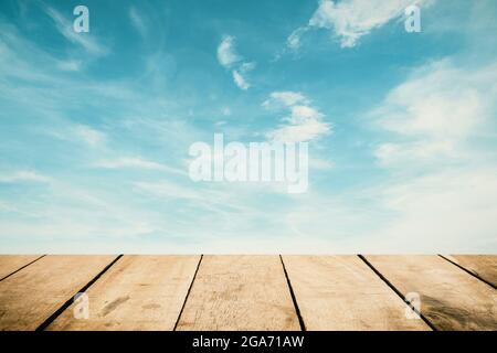 Panoramic empty grunge wood counter table top on blur glass window ...