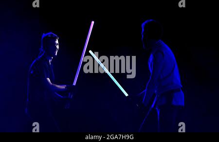 Laser swords fighting show, during a sports summer camp, in Milan Stock ...