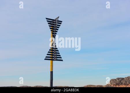West cardinal mark near a port Stock Photo - Alamy