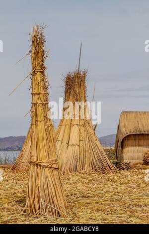 TITICACA, PERU - MAY 15, 2015: Boatman, inhabitant of Uros floating ...