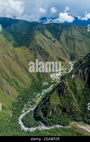 Aerial view of Urubamba valley (with hydroelectric station) from Machu ...