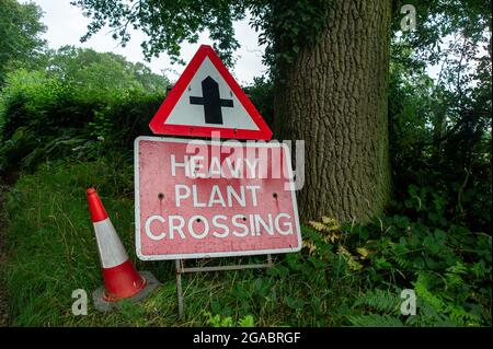 Heavy Plant crossing sign Stock Photo - Alamy