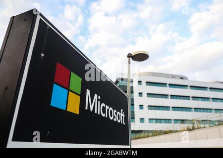 Microsoft sign and logo on the facade of corporation campus in Silicon ...