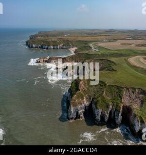 Filey bay and cliffs with Flamborough Head in the distance Stock Photo ...