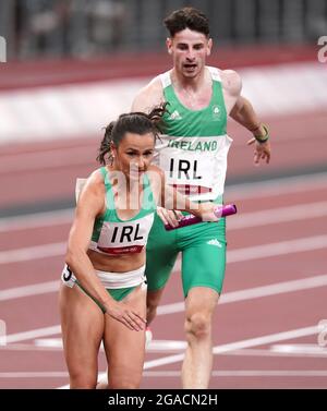 Ireland's Cillin Greene (back) hands the baton to Phil Healy during the ...