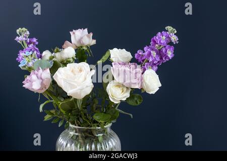 Bouquet of hackelia velutina, purple and white roses, small tea roses ...