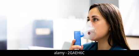 Asthma Patient Breathing Using Oxygen Mask And COPD Nebulizer Stock ...