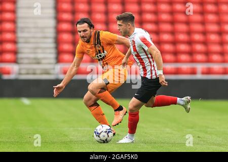Lewis Coyle #2 of Hull City breaks with the ball Stock Photo - Alamy