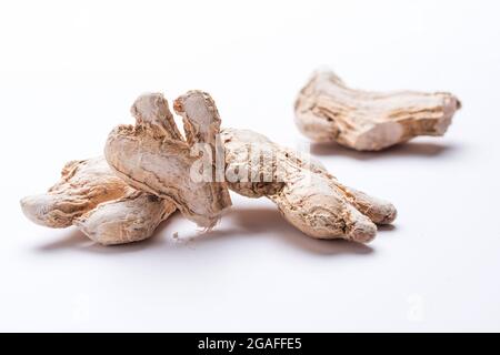Suntha, Zingiber officinale, Ginger against white background Stock ...