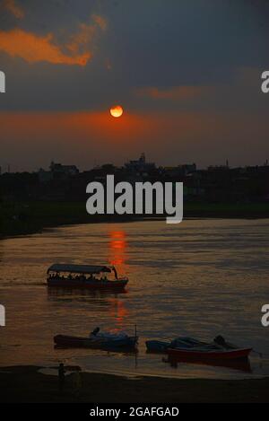 Lahore, Pakistan. 30th July, 2021. Pakistani people enjoying in Ravi ...