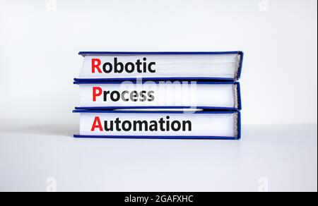 RPA, robotic process automation symbol. Wooden blocks with words RPA ...