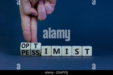Pessimist or optimist symbol. Businessman turns cubes and changes the ...