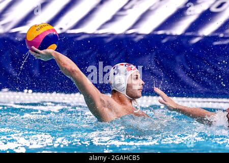 TOKYO, JAPAN - JULY 31: Loren Fatovic of Team Croatia and Milan Aleksic ...