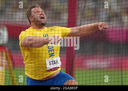 Sweden's Daniel Stahl reacts after winning the men's discus throw final ...
