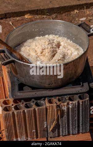 Artisanal sweet production in improvised wood stove Stock Photo - Alamy