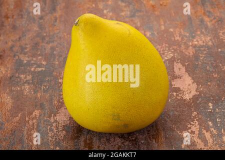 Ripe fresh Pomelo fruit over the wooden background Stock Photo - Alamy