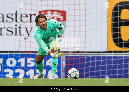 Chris Maxwell of Blackpool rolls the ball out Stock Photo - Alamy