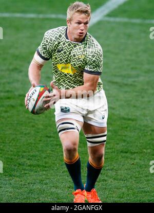 South African Pieter-Steph du Toit tackling British & Irish Lions Jack ...