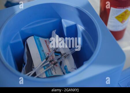 People get AstraZeneca Covid-19 vaccine at a vaccination centre in ...