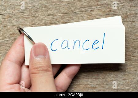 Man hold the flash card with handwriting word PDCA (Abbreviation of ...