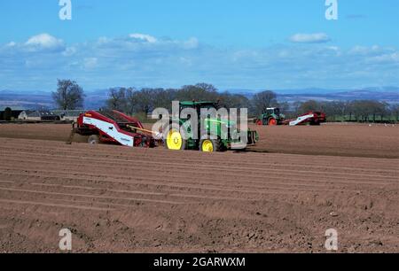 Tractor destoning and planting potatoes, Perthshire, Scotland - potato ...