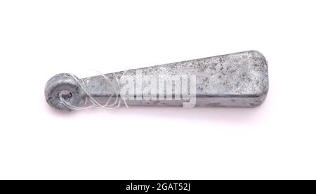 Old lead sinker with a bit of line still attached, isolated on white ...