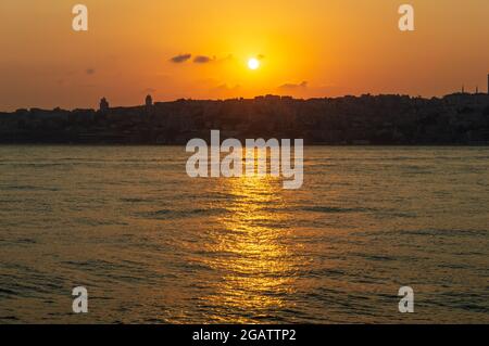 Orange bright sunset over istanbul and bosphorus Stock Photo - Alamy