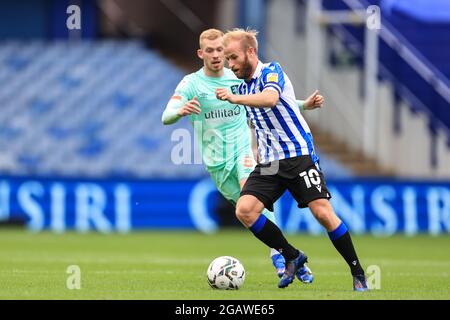 Lewis O'Brien of Huddersfield Town clears the ball during the Sky Bet ...