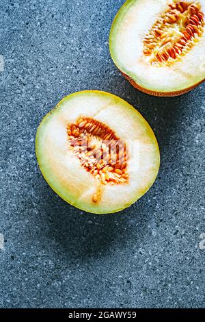 Ogen Melon, Halved on Plain Background with Copyspace, Room for Text ...