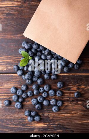 Fresh blueberries on a rustic paper background Stock Photo - Alamy