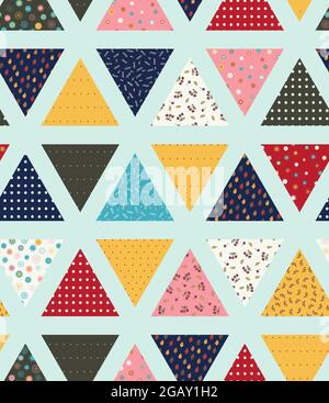 Seamless pattern of a patchwork quilt made from pieces of fabric with ...