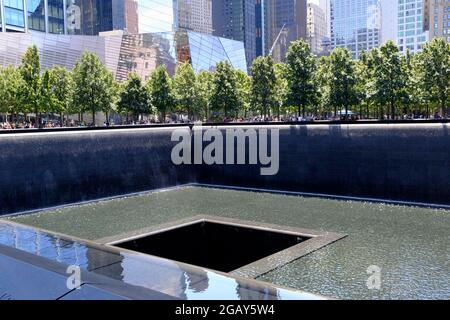 Reflecting pool and falls in the footprint of the Twin Towers at the 9 ...