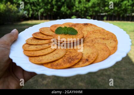 Delicious and spicy thick sundried potato chips wafers. Red chilly ...
