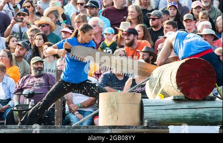 Hayward, USA. 1st Aug, 2021. A woman reacts during the 61st Lumberjack ...