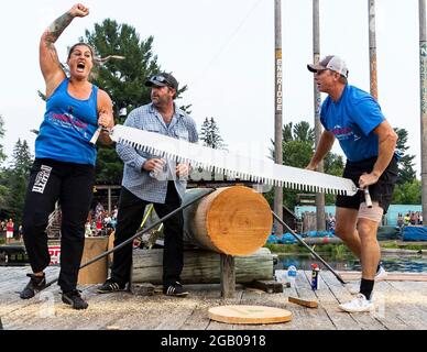 Hayward, USA. 1st Aug, 2021. Competitors use axes to chop wood during ...