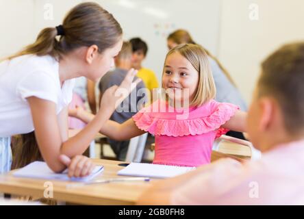 Schoolchildren performing team tasks Stock Photo - Alamy
