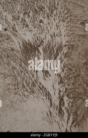 Bath, base, bottom with pattern of dirt, detritus, sand, grit leaving ...