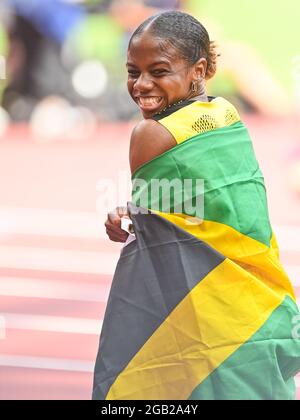 Megan Tapper, of Jamaica, poses with her bronze medal for the women's ...